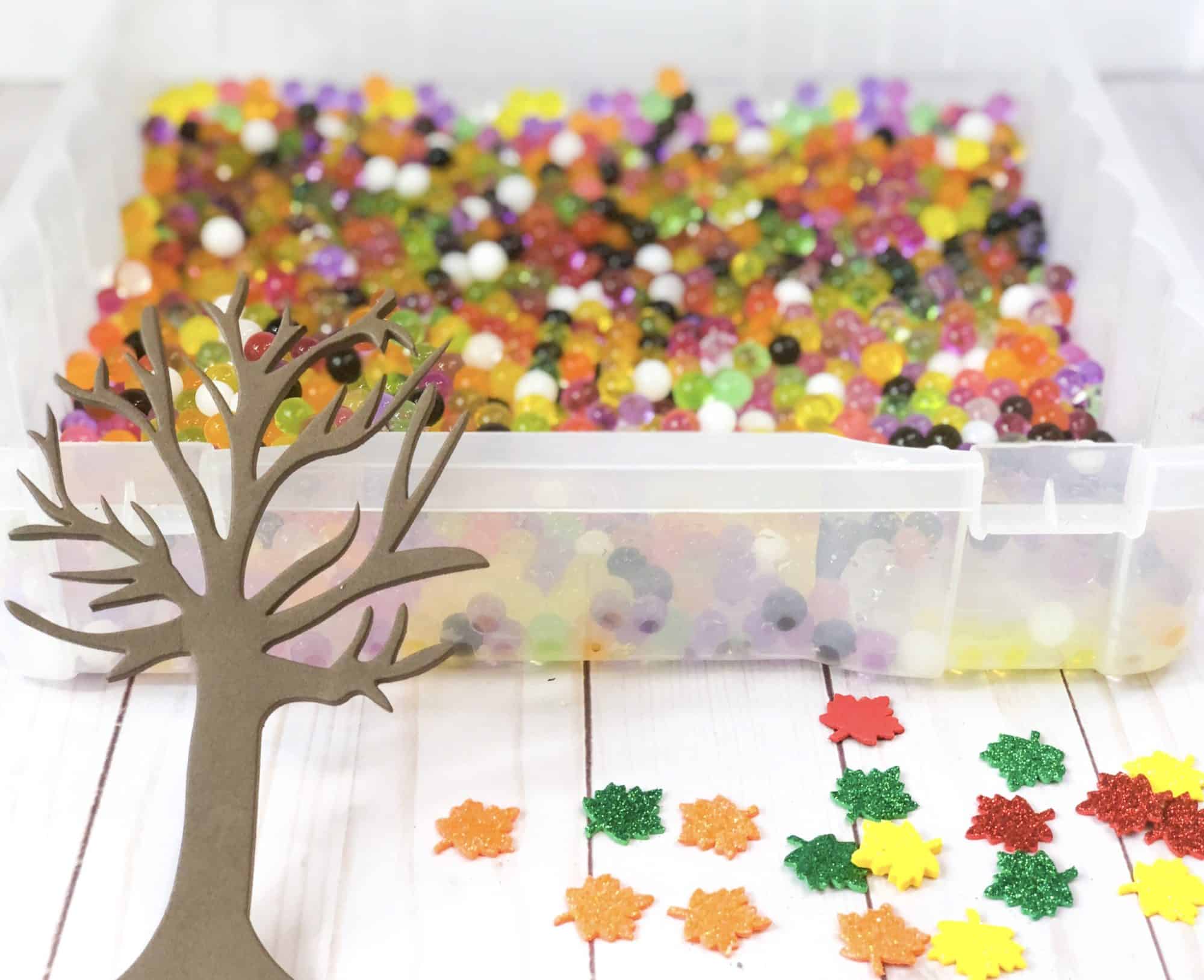 Fall Leaves Sensory Bin Hidden in Water Beads - Views From a Step Stool