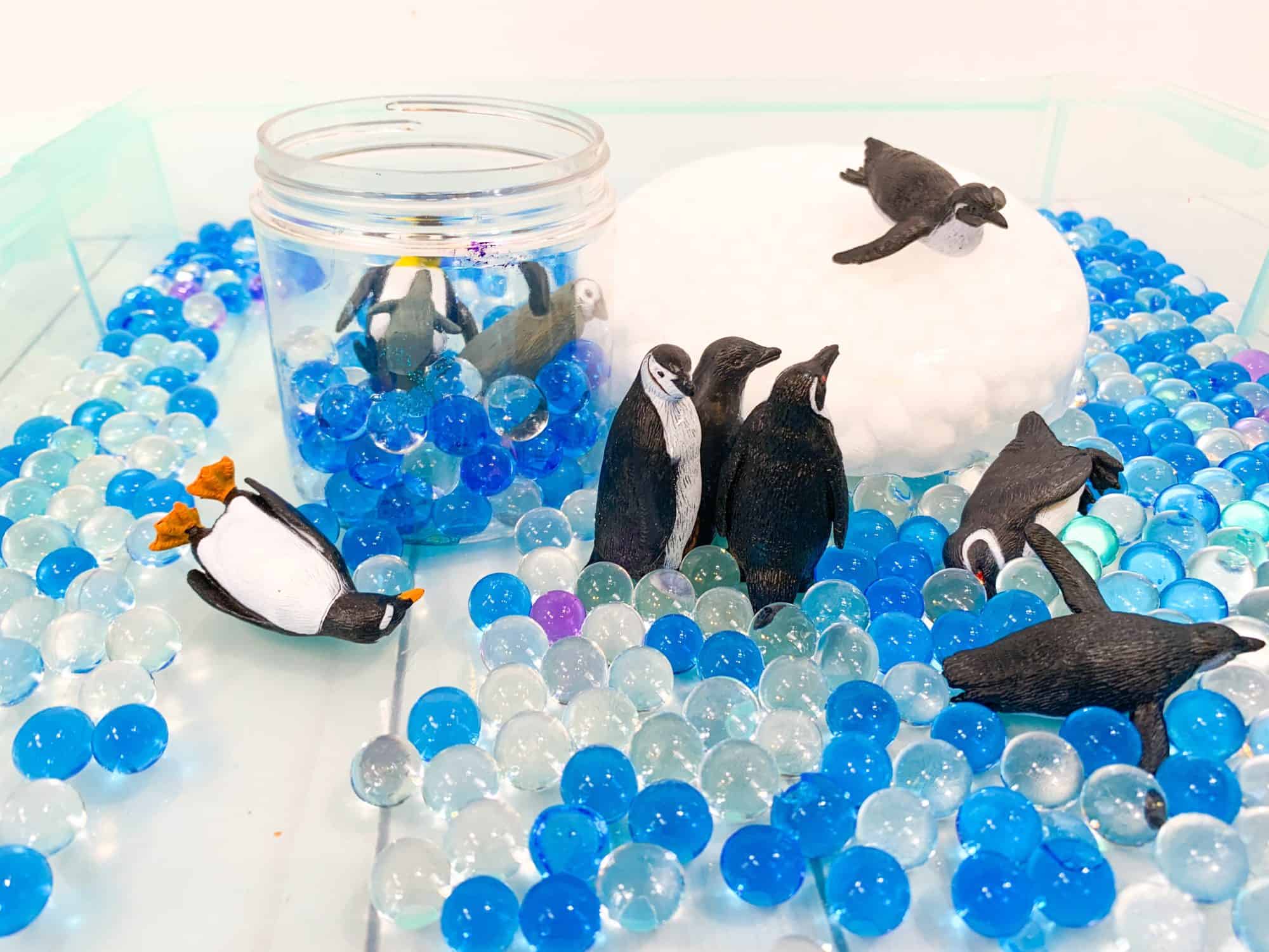 Penguin Sensory Bin with Frozen Water Beads - Views From a Step Stool