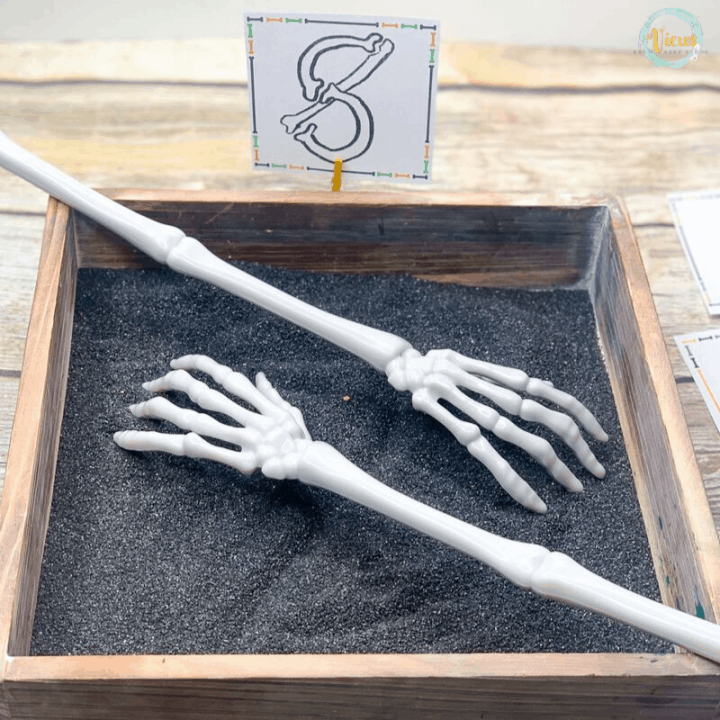 Skeleton Sand Tray for Halloween Sensory Play - Views From a Step Stool